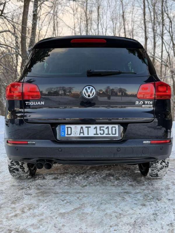 Black Volkswagen Tiguan 2013 in Utena, with an engine capacity of 1.97 L and mileage of 270 thousand km for 10950 €, photo 9 on AUTOMOTO.COM.LV