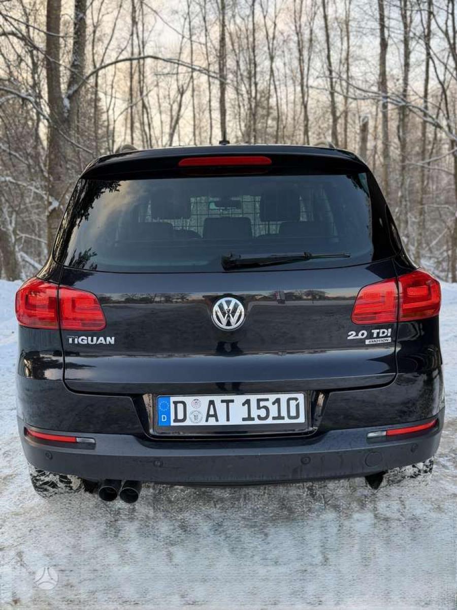 Black Volkswagen Tiguan 2013 in Utena, with an engine capacity of 1.97 L and mileage of 270 thousand km for 10950 €, photo 13 on AUTOMOTO.COM.LV