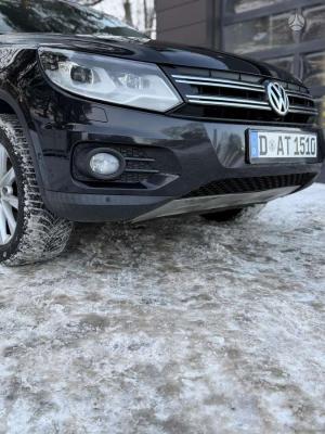Black Volkswagen Tiguan 2013 in Utena, with an engine capacity of 1.97 L and mileage of 270 thousand km for 10950 €, photo 17 on AUTOMOTO.COM.LV