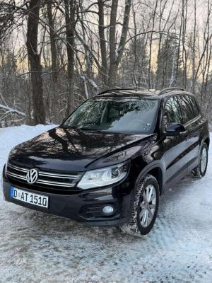 Black Volkswagen Tiguan 2013 in Utena, with an engine capacity of 1.97 L and mileage of 270 thousand km for 10950 €, photo 29 on AUTOMOTO.COM.LV