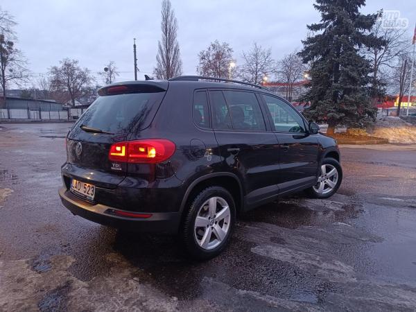 Black Volkswagen Tiguan 2013 in Kaunas, with an engine capacity of 2.00 L and mileage of 260 thousand km for 7300 €, photo 4 on AUTOMOTO.COM.LV