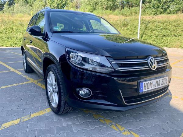 Black Volkswagen Tiguan 2013 in Vilnius, with an engine capacity of 1.97 L and mileage of 268 thousand km for 8300 €, photo 7 on AUTOMOTO.COM.LV