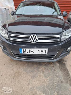 Black Volkswagen Tiguan 2013 in Vilnius, with an engine capacity of 2.00 L and mileage of 0 thousand km for 6500 €, photo  on AUTOMOTO.COM.LV