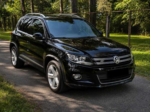 Black Volkswagen Tiguan 2013 in Vilnius, with an engine capacity of 1.97 L and mileage of 271 thousand km for 8700 €, photo 2 on AUTOMOTO.COM.LV