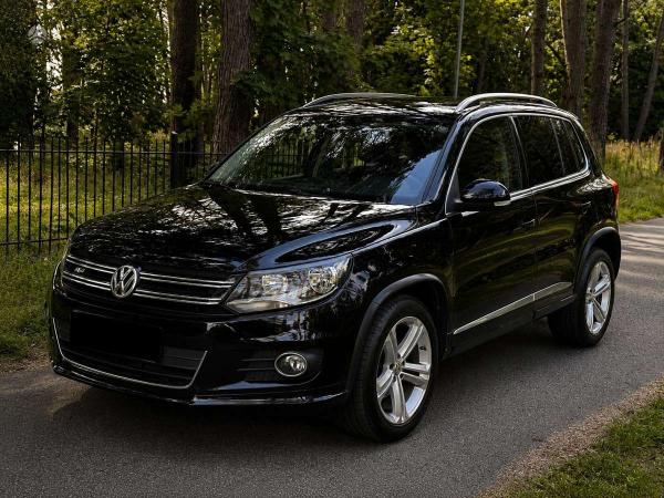 Black Volkswagen Tiguan 2013 in Vilnius, with an engine capacity of 1.97 L and mileage of 271 thousand km for 8700 €, photo 6 on AUTOMOTO.COM.LV