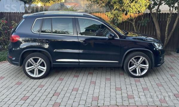 Melns Volkswagen Tiguan 2013 Rīga, ar dzinēja tilpumu 2.00 L un nobraukumu 245 tūkst. km par 10200 €, foto 1 vietnē AUTOMOTO.COM.LV