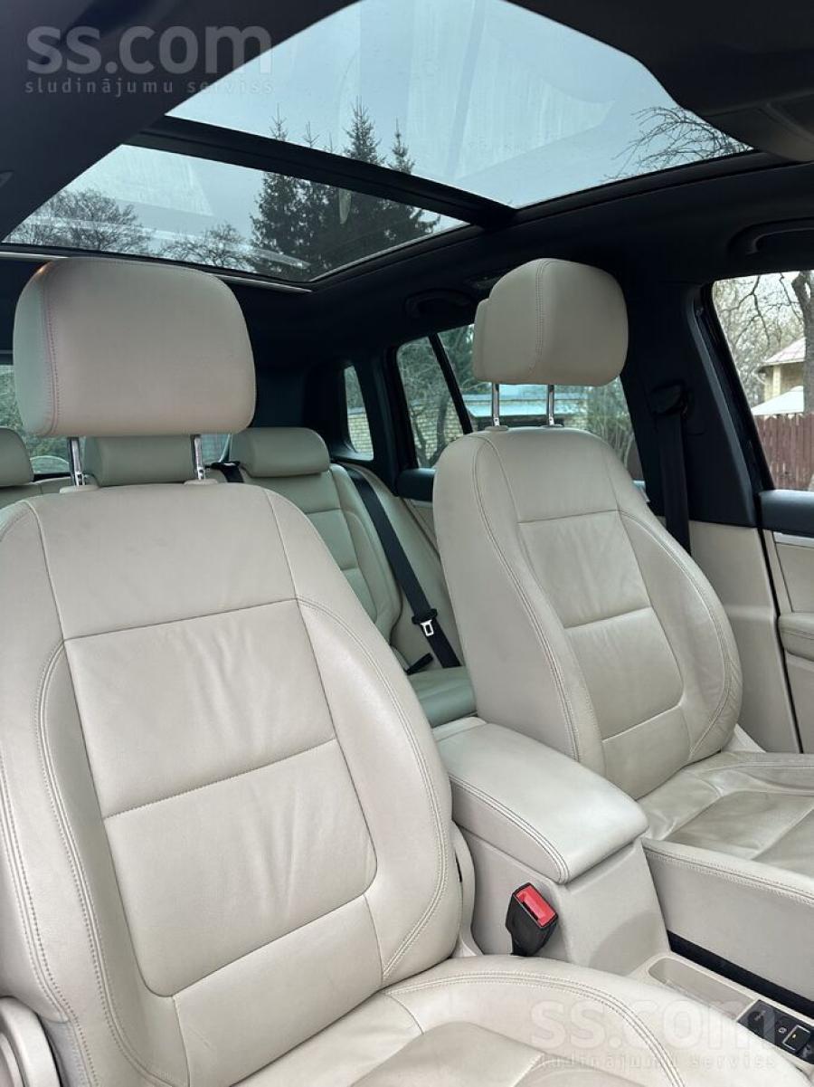 Black Volkswagen Tiguan 2013 in Riga, with an engine capacity of 2.00 L and mileage of 245 thousand km for 10200 €, photo 3 on AUTOMOTO.COM.LV