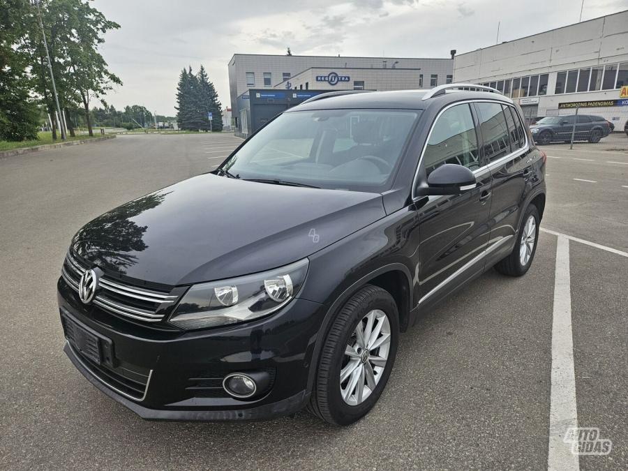 Black Volkswagen Tiguan 2013 in Panevezys, with an engine capacity of 2.00 L and mileage of 283 thousand km for 6800 €, photo 1 on AUTOMOTO.COM.LV