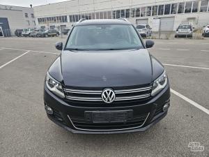 Black Volkswagen Tiguan 2013 in Panevezys, with an engine capacity of 2.00 L and mileage of 283 thousand km for 6800 €, photo 3 on AUTOMOTO.COM.LV
