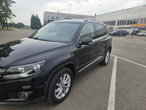 Black Volkswagen Tiguan 2013 in Panevezys, with an engine capacity of 2.00 L and mileage of 283 thousand km for 6800 €, photo 5 on AUTOMOTO.COM.LV