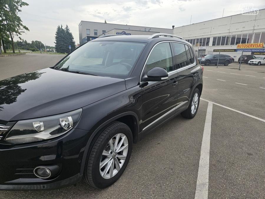 Black Volkswagen Tiguan 2013 in Panevezys, with an engine capacity of 2.00 L and mileage of 283 thousand km for 6800 €, photo 5 on AUTOMOTO.COM.LV