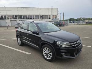 Black Volkswagen Tiguan 2013 in Panevezys, with an engine capacity of 2.00 L and mileage of 283 thousand km for 6800 €, photo 6 on AUTOMOTO.COM.LV