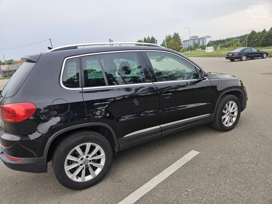 Black Volkswagen Tiguan 2013 in Panevezys, with an engine capacity of 2.00 L and mileage of 283 thousand km for 6800 €, photo 7 on AUTOMOTO.COM.LV