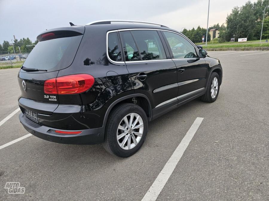 Black Volkswagen Tiguan 2013 in Panevezys, with an engine capacity of 2.00 L and mileage of 283 thousand km for 6800 €, photo 12 on AUTOMOTO.COM.LV