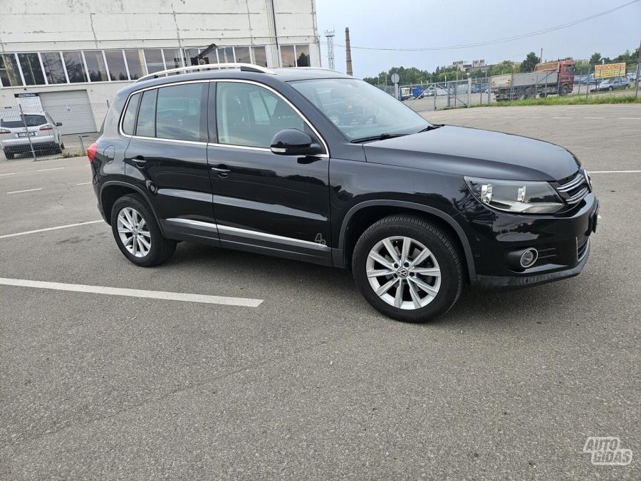 Black Volkswagen Tiguan 2013 in Panevezys, with an engine capacity of 2.00 L and mileage of 283 thousand km for 6800 €, photo 13 on AUTOMOTO.COM.LV