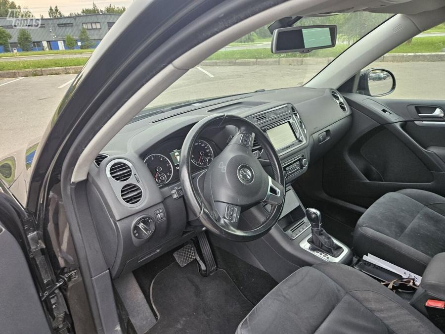 Black Volkswagen Tiguan 2013 in Panevezys, with an engine capacity of 2.00 L and mileage of 283 thousand km for 6800 €, photo 14 on AUTOMOTO.COM.LV