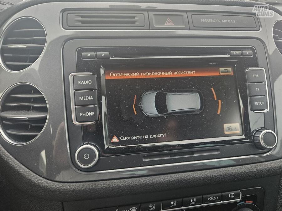 Black Volkswagen Tiguan 2013 in Panevezys, with an engine capacity of 2.00 L and mileage of 283 thousand km for 6800 €, photo 27 on AUTOMOTO.COM.LV