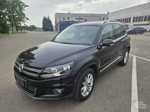 Black Volkswagen Tiguan 2013 in Panevezys, with an engine capacity of 2.00 L and mileage of 293 thousand km for 6999 €, photo  on AUTOMOTO.COM.LV