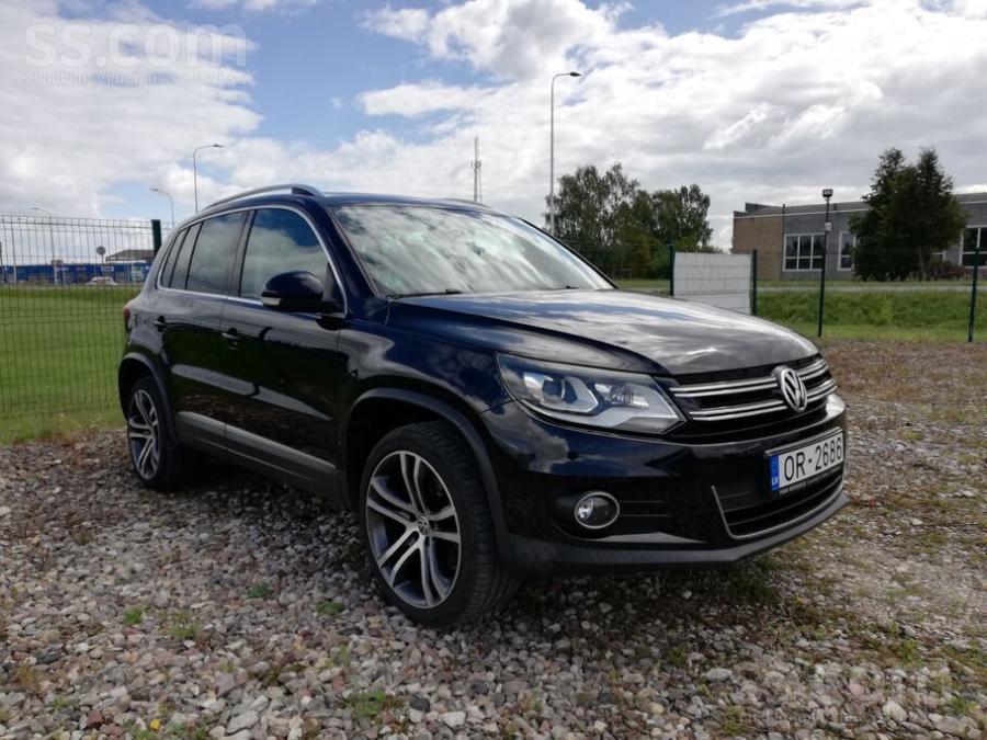 Melns Volkswagen Tiguan 2013 Saldus, ar dzinēja tilpumu 2.00 L un nobraukumu 208 tūkst. km par 8990 €, foto 4 vietnē AUTOMOTO.COM.LV