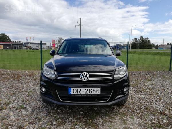 Volkswagen Tiguan 2013 Saldus vietnÄ Melns Volkswagen Tiguan 2013 Saldus, ar dzinÄja tilpumu 2.00 L un nobraukumu 208 tÅ«kst. km par 8990 ā¬, foto 6 vietnÄ AUTOMOTO.COM.LV