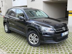 Black Volkswagen Tiguan 2013 in Vilnius, with an engine capacity of 2.00 L and mileage of 238 thousand km for 5300 €, photo  on AUTOMOTO.COM.LV