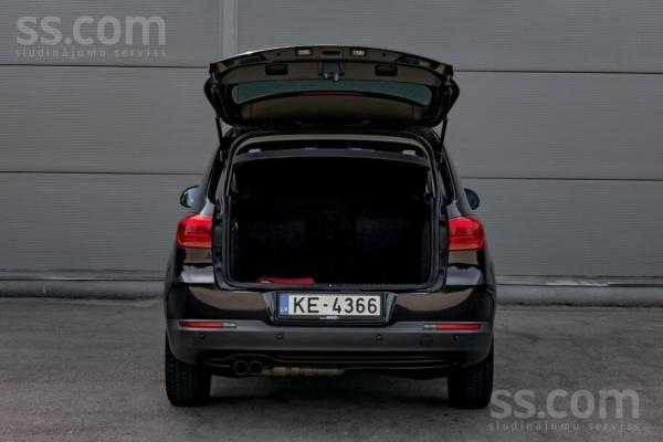 Black Volkswagen Tiguan 2014 in Riga, with an engine capacity of 1.40 L and mileage of 0 thousand km for 8653 €, photo 6 on AUTOMOTO.COM.LV