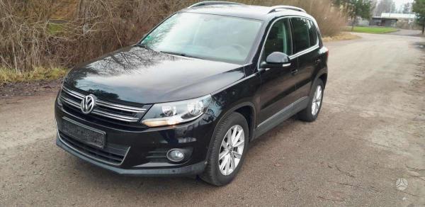 Black Volkswagen Tiguan 2014 in Panevezys, with an engine capacity of 1.39 L and mileage of 47 thousand km for 9350 €, photo 1 on AUTOMOTO.COM.LV