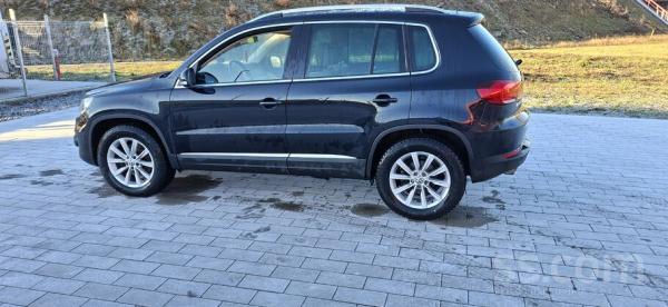 Black Volkswagen Tiguan 2014 in Jekabpils, with an engine capacity of 2.00 L and mileage of 238 thousand km for 12860 €, photo 7 on AUTOMOTO.COM.LV