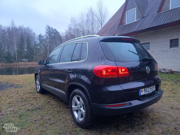 Black Volkswagen Tiguan 2014 in Siauliai, with an engine capacity of 1.40 L and mileage of 152 thousand km for 9100 €, photo 4 on AUTOMOTO.COM.LV