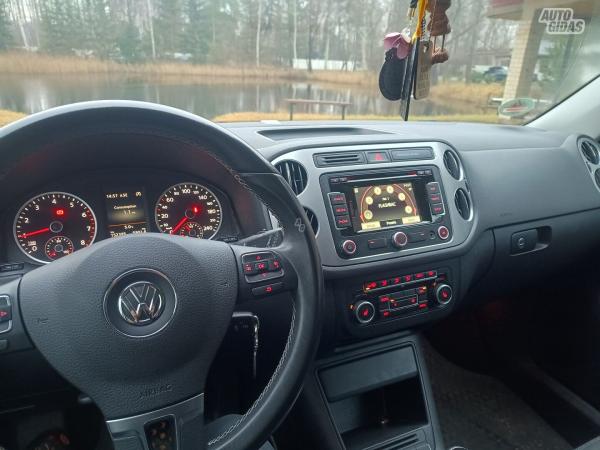 Black Volkswagen Tiguan 2014 in Siauliai, with an engine capacity of 1.40 L and mileage of 152 thousand km for 9100 €, photo 6 on AUTOMOTO.COM.LV