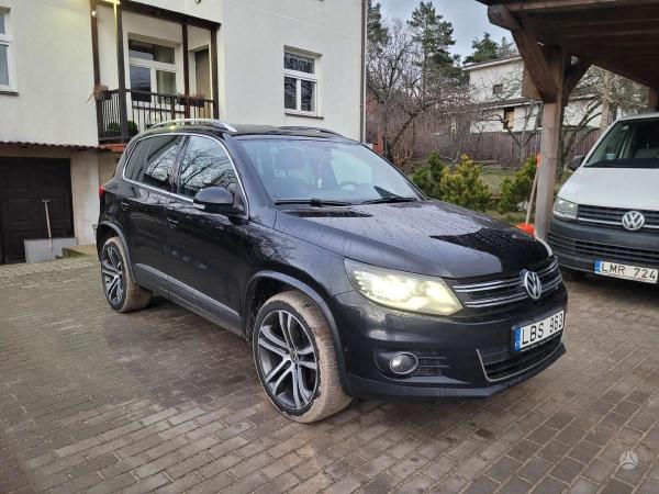 Black Volkswagen Tiguan 2014 in Vilnius, with an engine capacity of 1.97 L and mileage of 275 thousand km for 11500 €, photo 3 on AUTOMOTO.COM.LV
