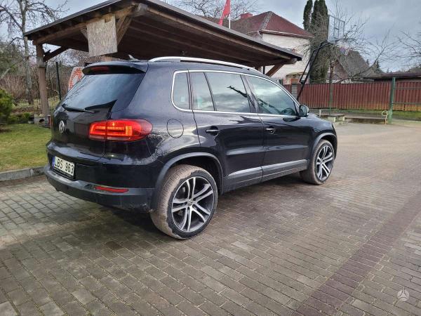 Black Volkswagen Tiguan 2014 in Vilnius, with an engine capacity of 1.97 L and mileage of 275 thousand km for 11500 €, photo 4 on AUTOMOTO.COM.LV
