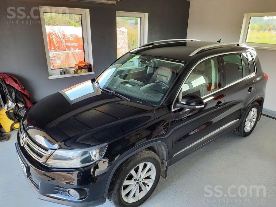 Black Volkswagen Tiguan 2014 in Riga, with an engine capacity of 2.00 L and mileage of 240 thousand km for 12000 €, photo 2 on AUTOMOTO.COM.LV