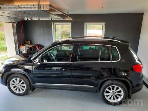 Black Volkswagen Tiguan 2014 in Riga, with an engine capacity of 2.00 L and mileage of 240 thousand km for 12000 €, photo 3 on AUTOMOTO.COM.LV