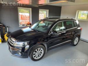 Black Volkswagen Tiguan 2014 in Riga, with an engine capacity of 2.00 L and mileage of 240 thousand km for 12000 €, photo 4 on AUTOMOTO.COM.LV