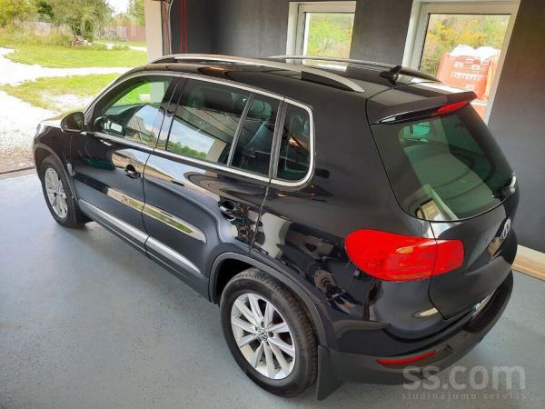 Black Volkswagen Tiguan 2014 in Riga, with an engine capacity of 2.00 L and mileage of 240 thousand km for 12000 €, photo 5 on AUTOMOTO.COM.LV