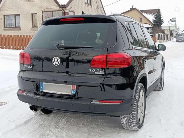 Black Volkswagen Tiguan 2014 in Marijampole, with an engine capacity of 1.97 L and mileage of 293 thousand km for 9850 €, photo 6 on AUTOMOTO.COM.LV