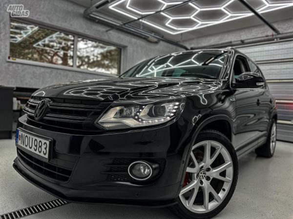 Black Volkswagen Tiguan 2014 in Kaunas, with an engine capacity of 2.00 L and mileage of 339 thousand km for 8650 €, photo 2 on AUTOMOTO.COM.LV