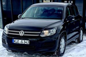 Black Volkswagen Tiguan 2014 in Kretinga, with an engine capacity of 1.40 L and mileage of 146 thousand km for 8499 €, photo  on AUTOMOTO.COM.LV