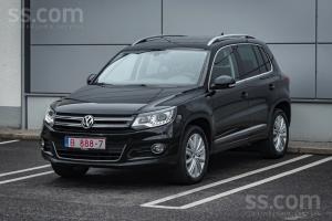 Black Volkswagen Tiguan 2014 in Riga, with an engine capacity of 2.00 L and mileage of 185 thousand km for 11750 €, photo  on AUTOMOTO.COM.LV