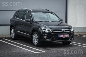 Black Volkswagen Tiguan 2014 in Riga, with an engine capacity of 2.00 L and mileage of 185 thousand km for 11750 €, photo 4 on AUTOMOTO.COM.LV