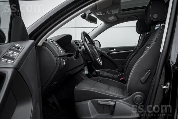 Black Volkswagen Tiguan 2014 in Riga, with an engine capacity of 2.00 L and mileage of 185 thousand km for 11750 €, photo 10 on AUTOMOTO.COM.LV