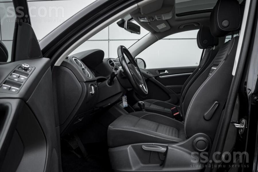 Black Volkswagen Tiguan 2014 in Riga, with an engine capacity of 2.00 L and mileage of 185 thousand km for 11750 €, photo 11 on AUTOMOTO.COM.LV