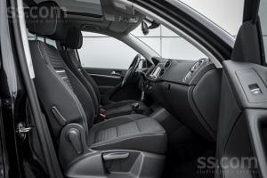 Black Volkswagen Tiguan 2014 in Riga, with an engine capacity of 2.00 L and mileage of 185 thousand km for 11750 €, photo 12 on AUTOMOTO.COM.LV