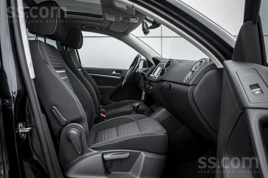 Black Volkswagen Tiguan 2014 in Riga, with an engine capacity of 2.00 L and mileage of 185 thousand km for 11750 €, photo 12 on AUTOMOTO.COM.LV