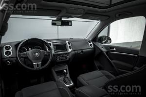 Black Volkswagen Tiguan 2014 in Riga, with an engine capacity of 2.00 L and mileage of 185 thousand km for 11750 €, photo 16 on AUTOMOTO.COM.LV