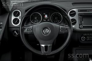 Black Volkswagen Tiguan 2014 in Riga, with an engine capacity of 2.00 L and mileage of 185 thousand km for 11750 €, photo 20 on AUTOMOTO.COM.LV