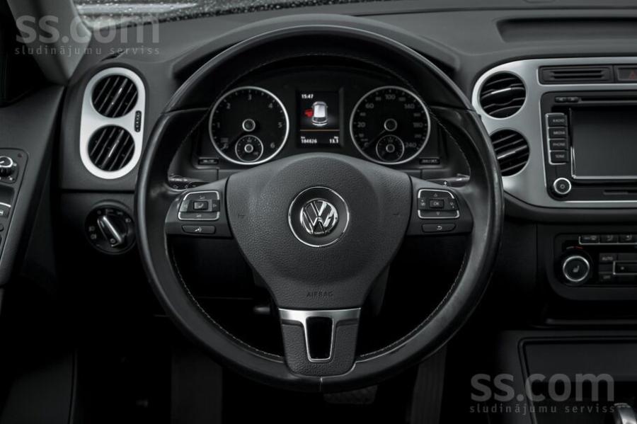 Black Volkswagen Tiguan 2014 in Riga, with an engine capacity of 2.00 L and mileage of 185 thousand km for 11750 €, photo 20 on AUTOMOTO.COM.LV