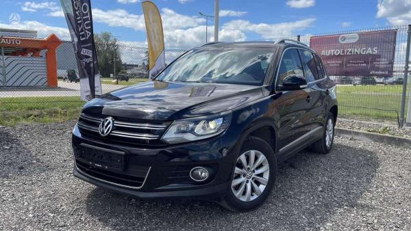 Black Volkswagen Tiguan 2014 in Marijampole, with an engine capacity of 1.97 L and mileage of 320 thousand km for 8990 €, photo 1 on AUTOMOTO.COM.LV