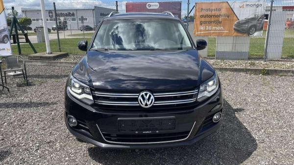 Black Volkswagen Tiguan 2014 in Marijampole, with an engine capacity of 1.97 L and mileage of 320 thousand km for 8990 €, photo 5 on AUTOMOTO.COM.LV